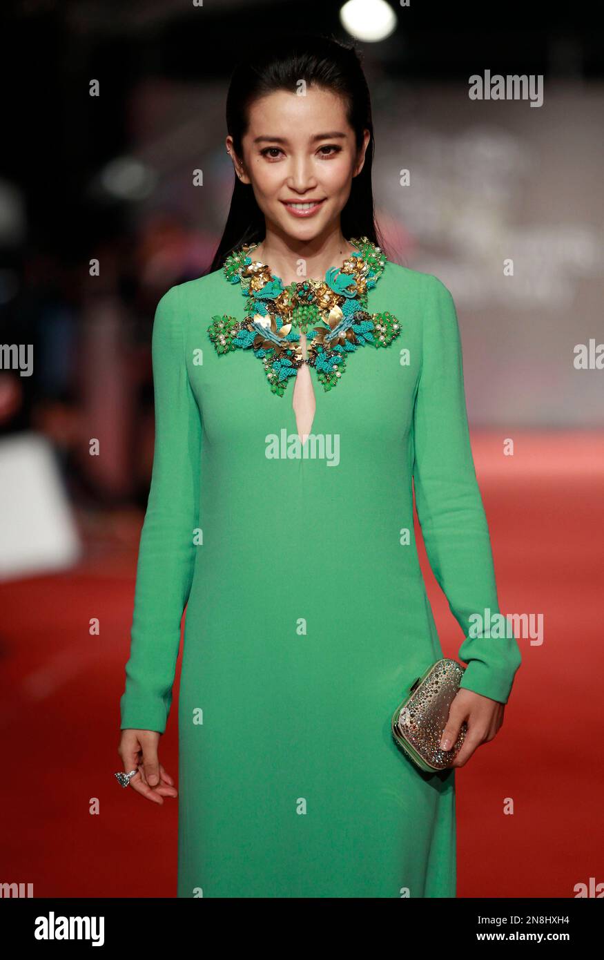 Chinese actress Li Bingbing smiles as she arrives at the 49th Golden ...