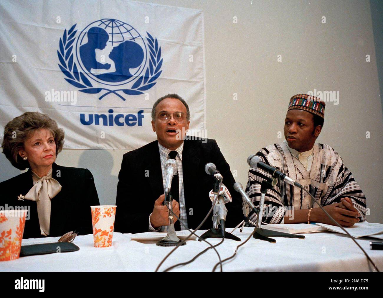UNICEF goodwill ambassador Harry Belafonte, center, speaks about the ...
