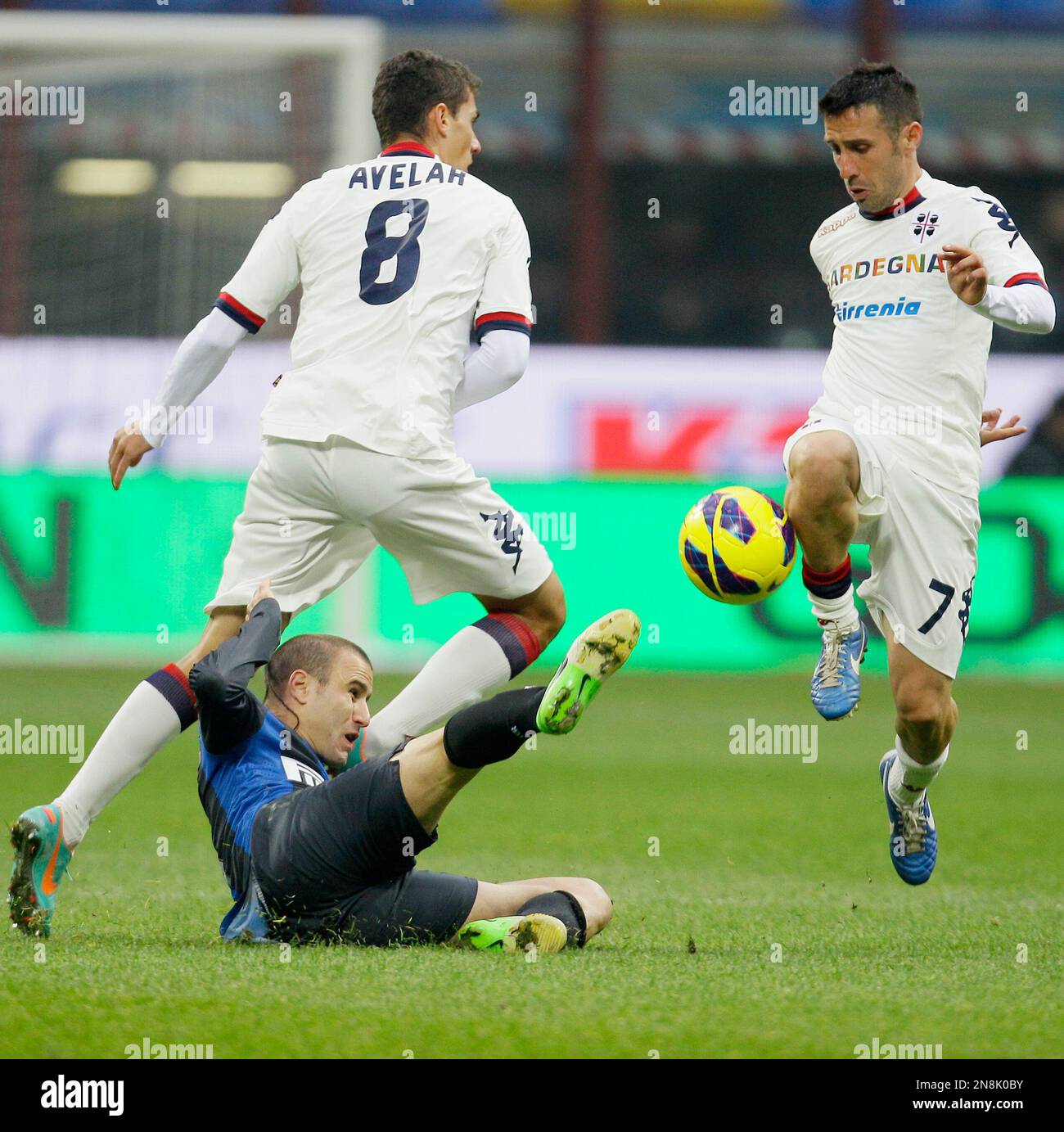 Inter Milan forward Rodrigo Palacio, bottom, of Argentina, challenges ...