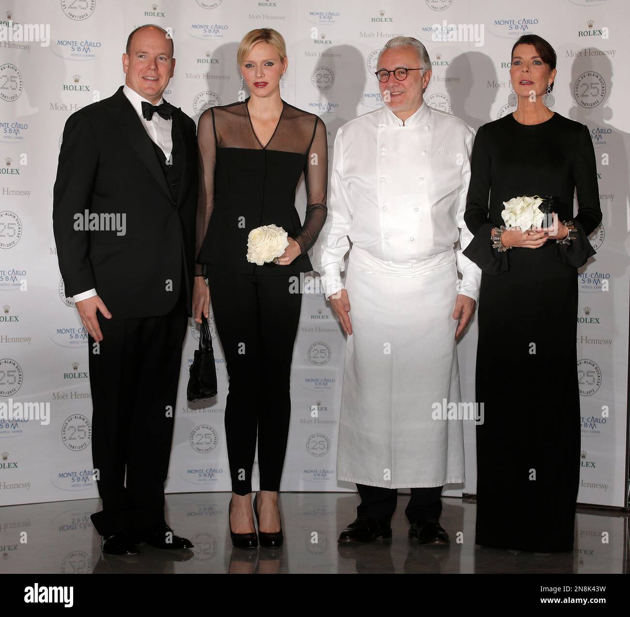 French chef Alain Ducasse, 2nd right, poses with Prince Albert II of ...