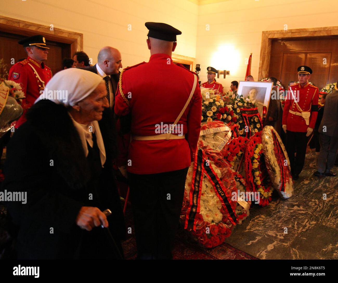 People pay their last respects to the remains of Albania's only post ...