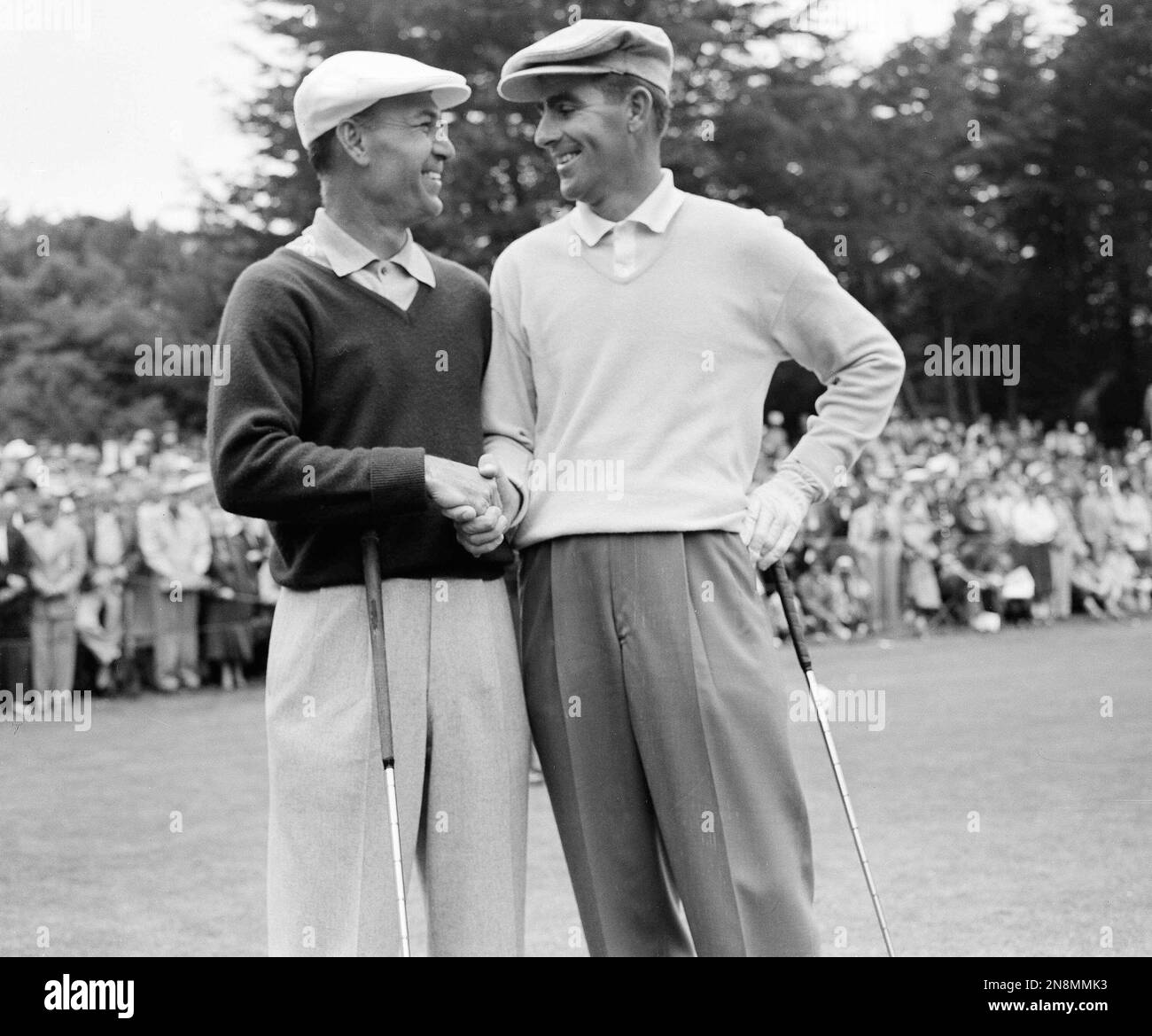 Ben Hogan, left, and Jack Fleck shake hands before teeing off at San ...