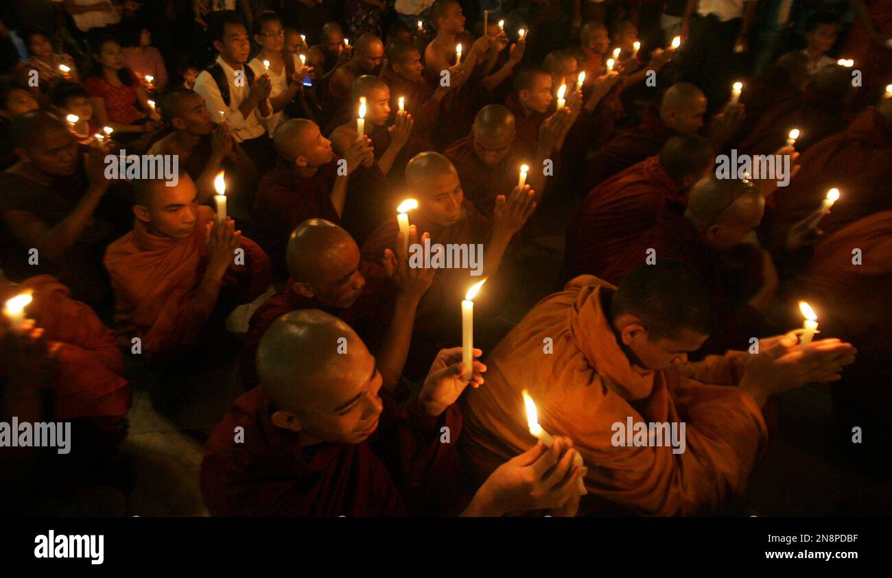 In this photo taken on Tuesday, Oct. 30, 2012, Buddhist monks and ...
