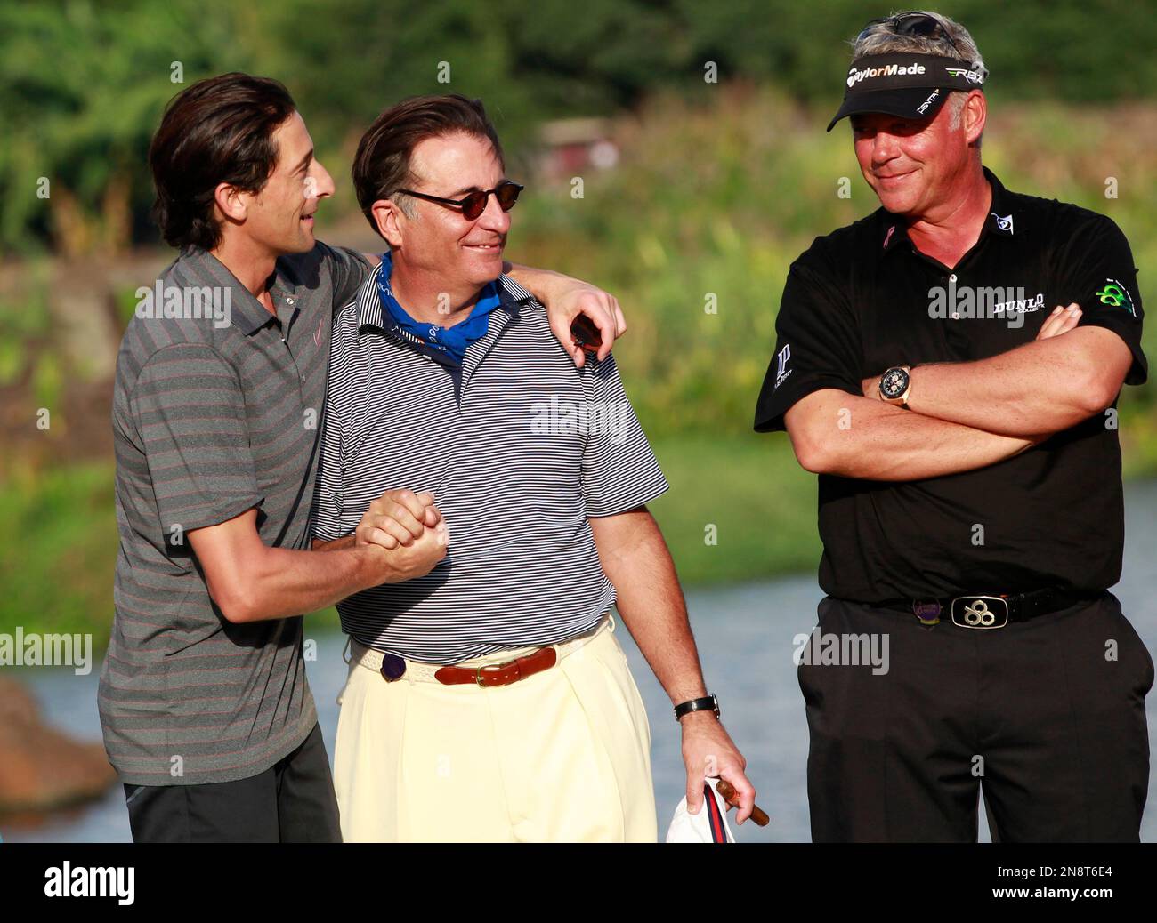 American actor Adrien Brody, left, speaks to his compatriot actor Andy ...