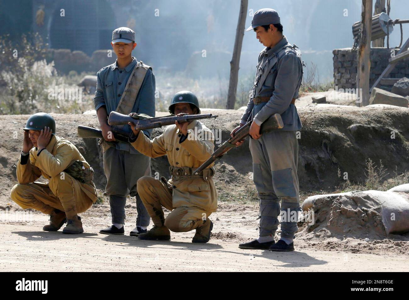 In this photo taken Friday, Oct. 19, 2012, actors dressed as communist ...