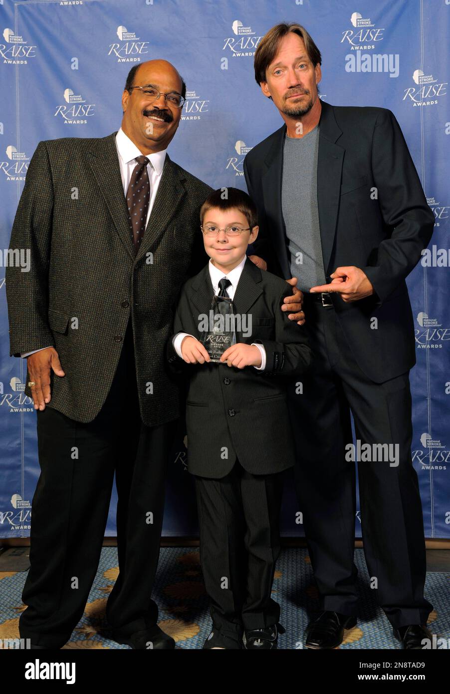 Nine-year-old stroke survivor Elijah Rutherford is seen with fellow ...