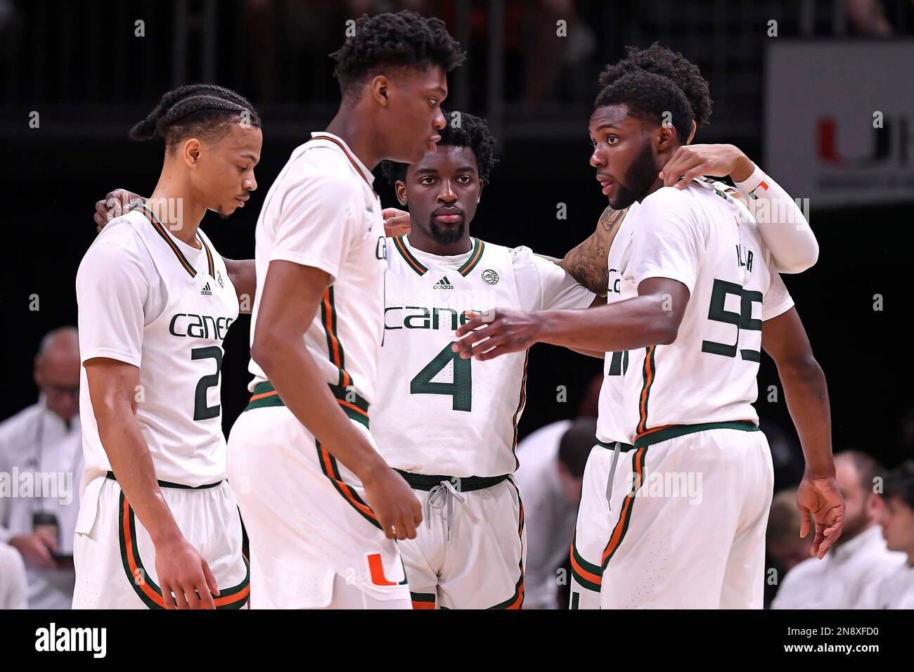 CORAL GABLES, FL - FEB 11: Miami's players (pictured, guard Isaiah Wong ...