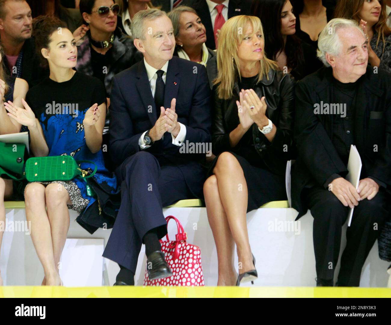 French actress Berenice Bejo, left, luxury good group LVMH CEO Bernard ...