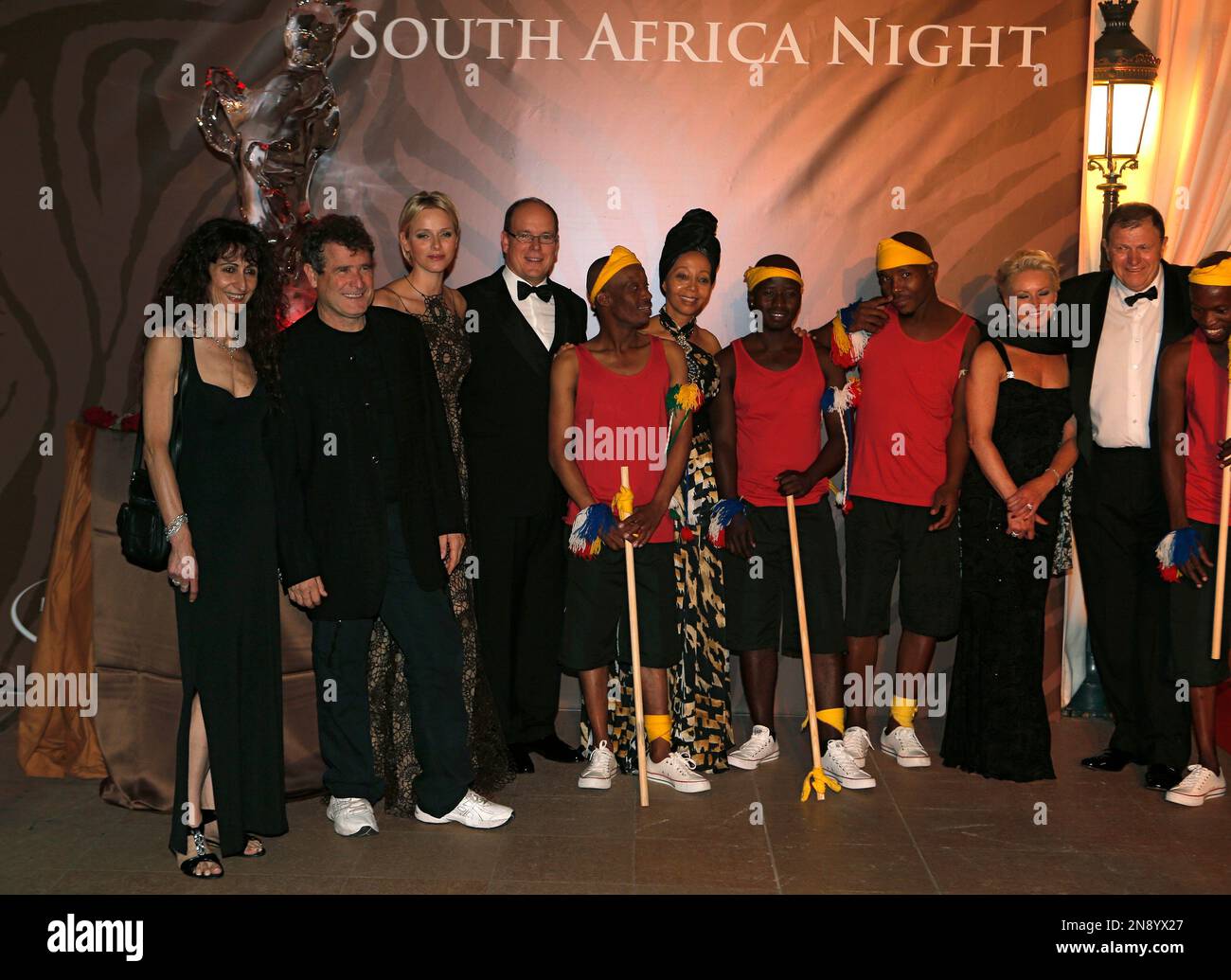 Prince Albert of Monaco and his wife Princess Charlene pose with South ...