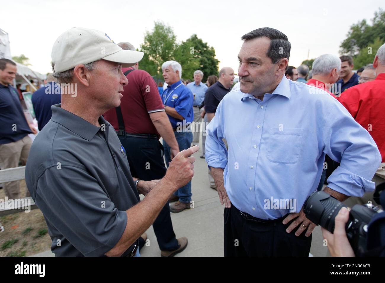 Indiana Gov. Mitch Daniels, left, chats with Rep. Joe Donnelly, D-Ind ...