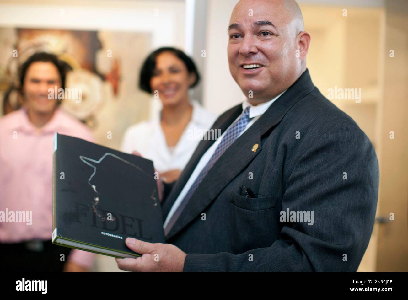Alex Castro, photographer and son of Cuban leader Fidel Castro, holds a ...