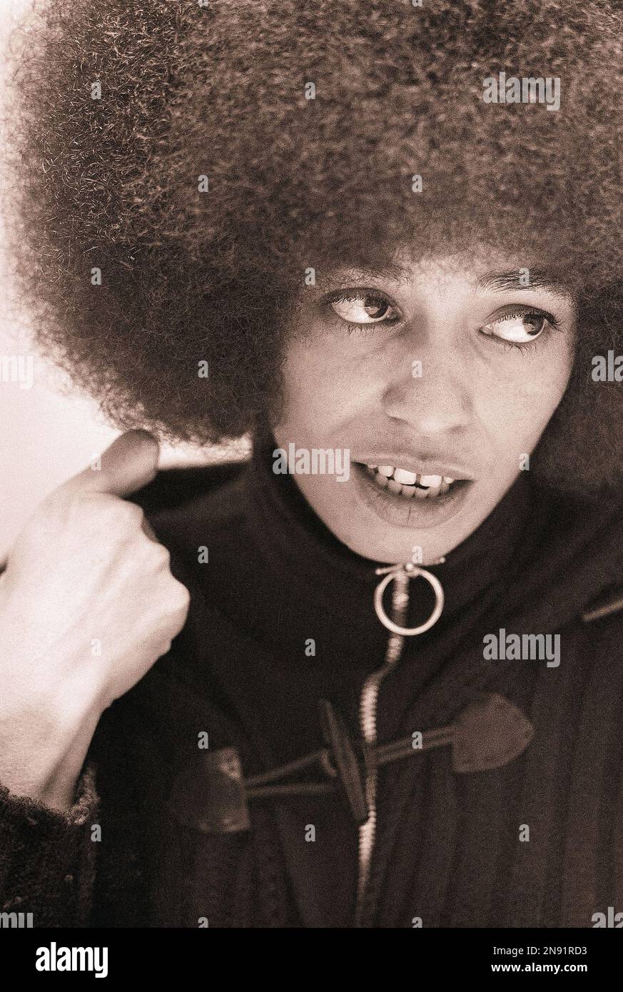 Jailed revolutionary Angela Davis uses her hands to emphasize comments ...