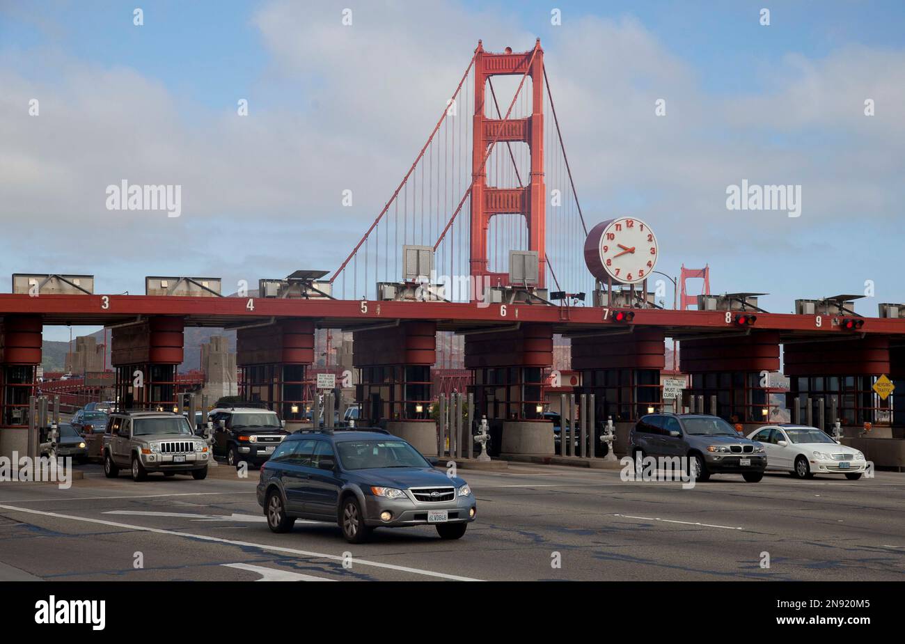 Drivers make their way past toll booths at the Golden Gate Bridge in ...