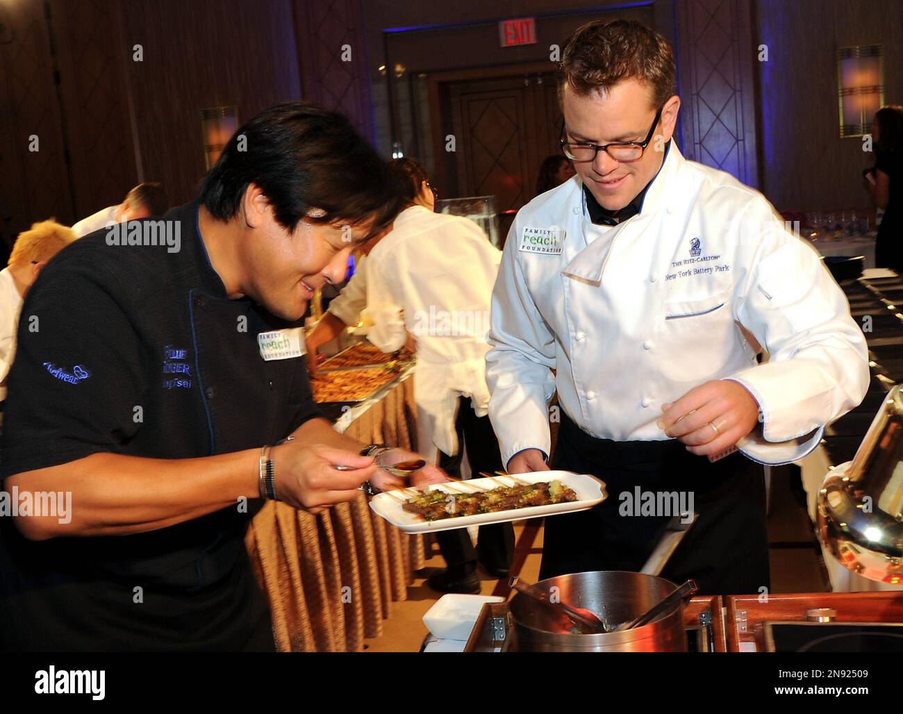 Actor Matt Damon, right, and Chef Ming Tsai participate in "Cooking ...