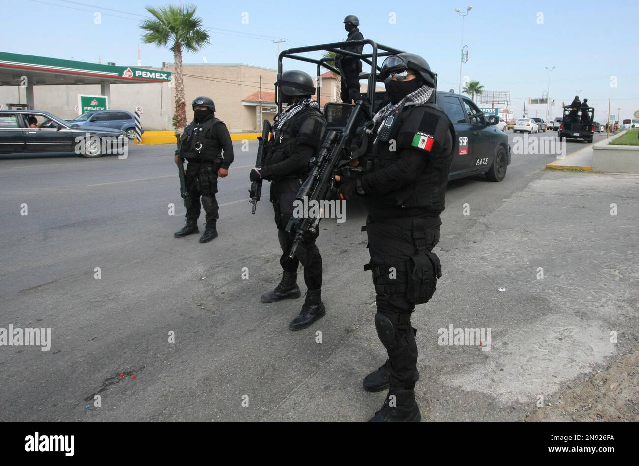 Rapid response Coahuila state police stand at a checkpoint in the city ...