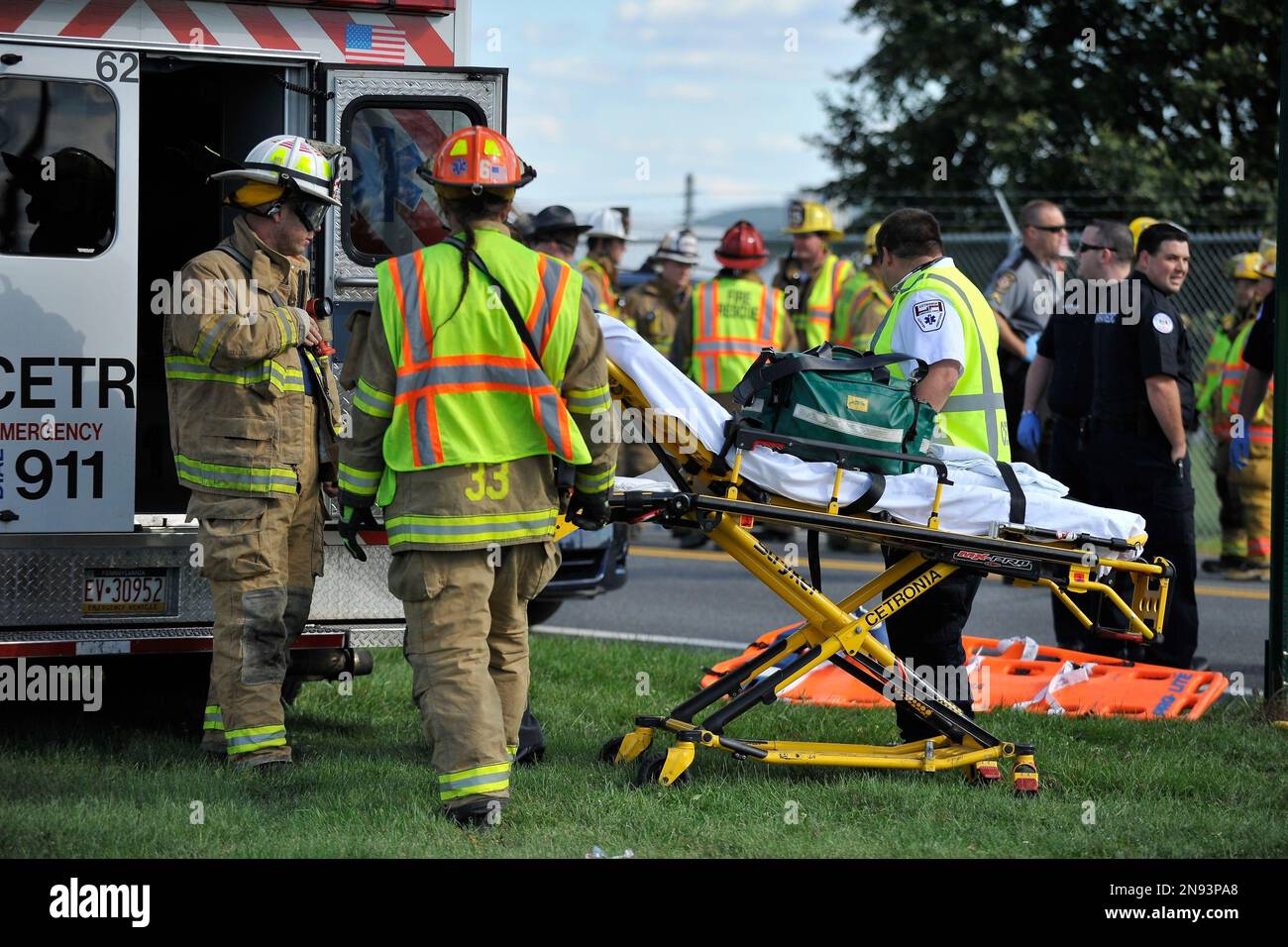 Rescue crews respond to the scene where officials say a sport utility ...