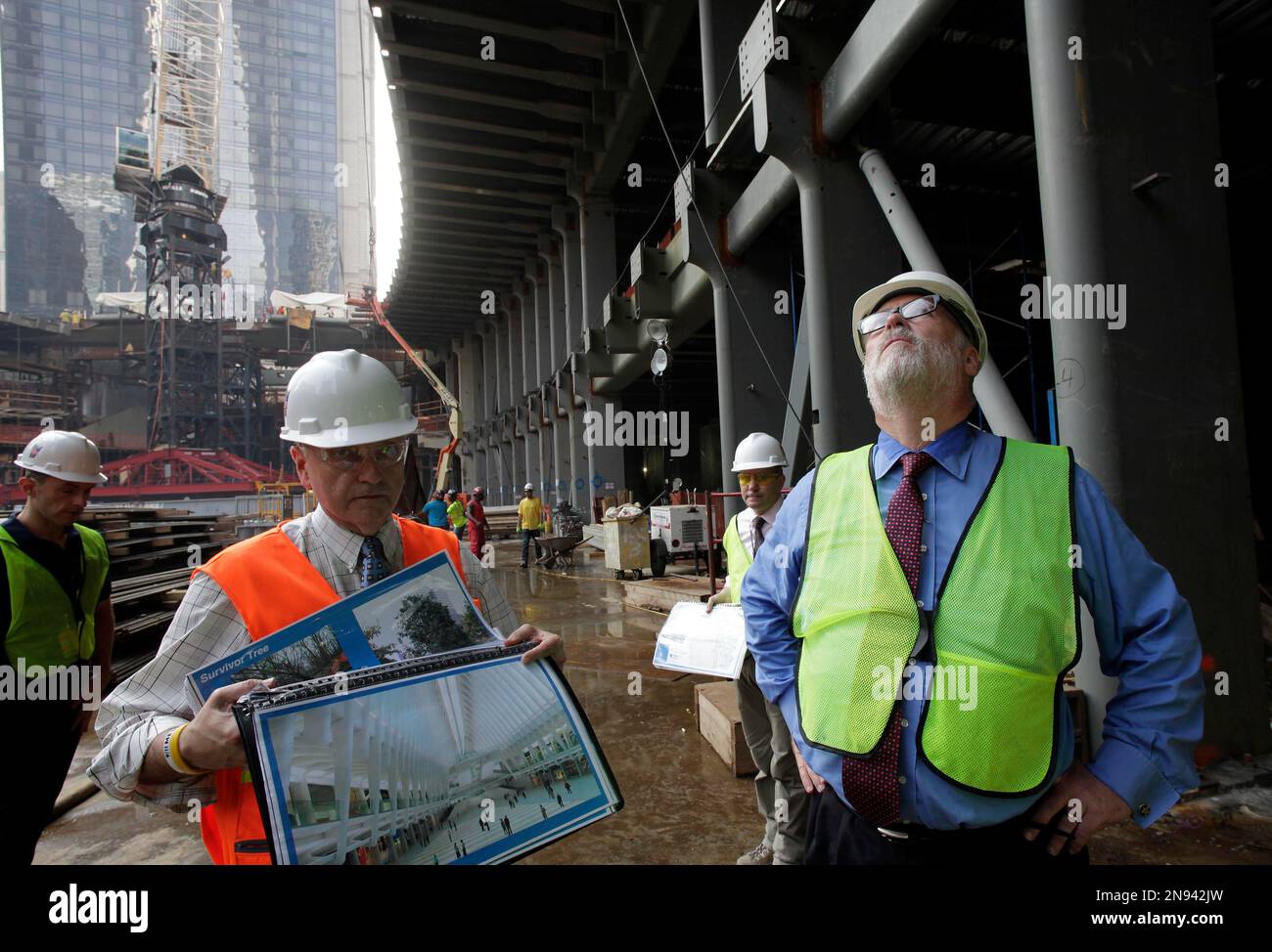 In this Friday, Sept. 7, 2012 photo, Steve Plate, left, Director of ...