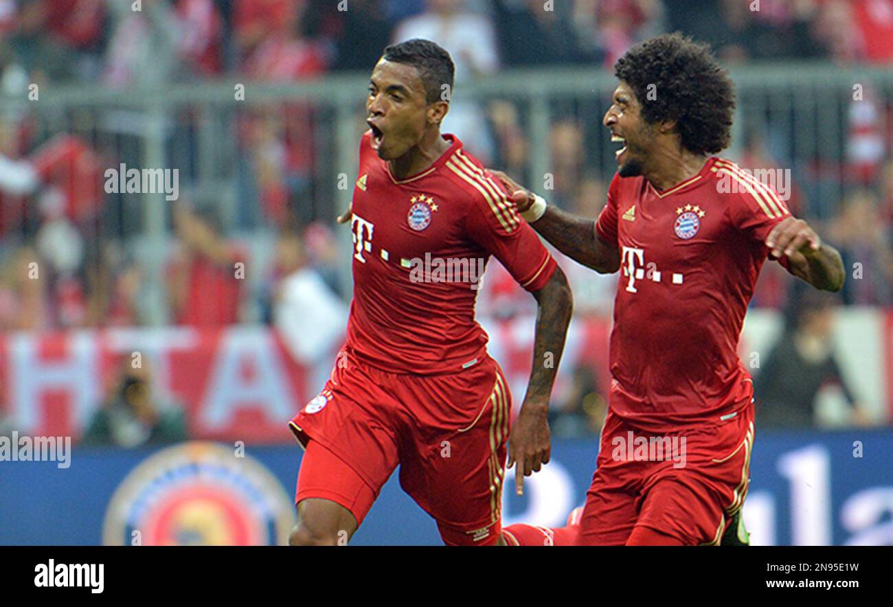 Bayern's Luiz Gustavo of Brazil, left, and Bayern's Dante of Brazil ...
