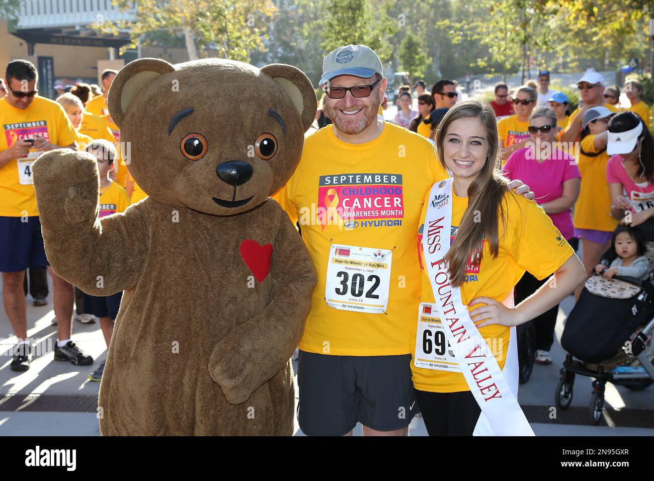 From left, Choco Bear, the mascot of Children's Hospital of Orange ...