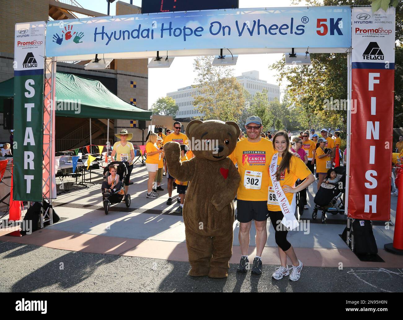 From left, Choco Bear, the mascot of Children's Hospital of Orange ...
