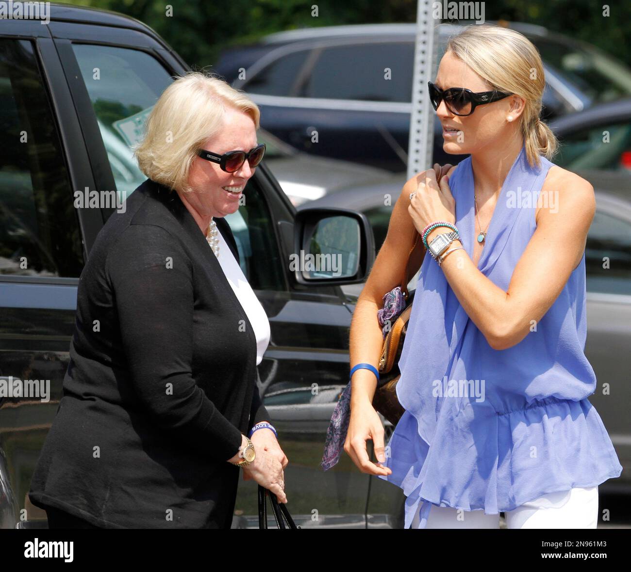 Sharon Love, left, mother of victim Yardley Love, and her daughter ...