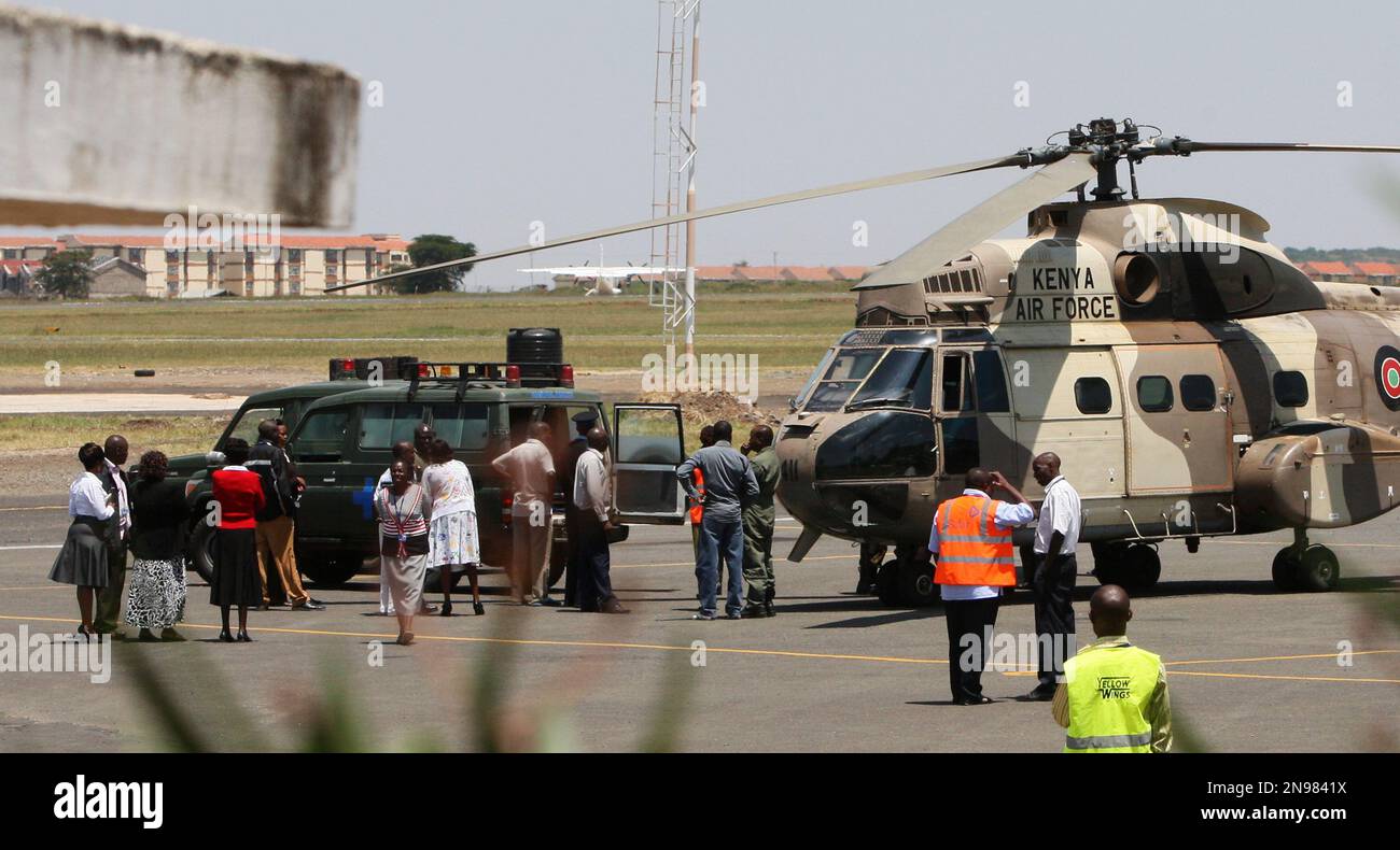 A Kenya Air Force helicopter transporting the bodies of Ugandan Army ...