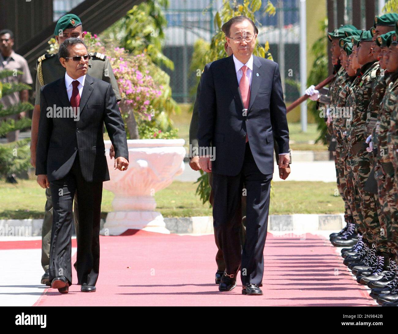 UN Secretary General Ban Ki-moon, center, inspects honor guards with ...