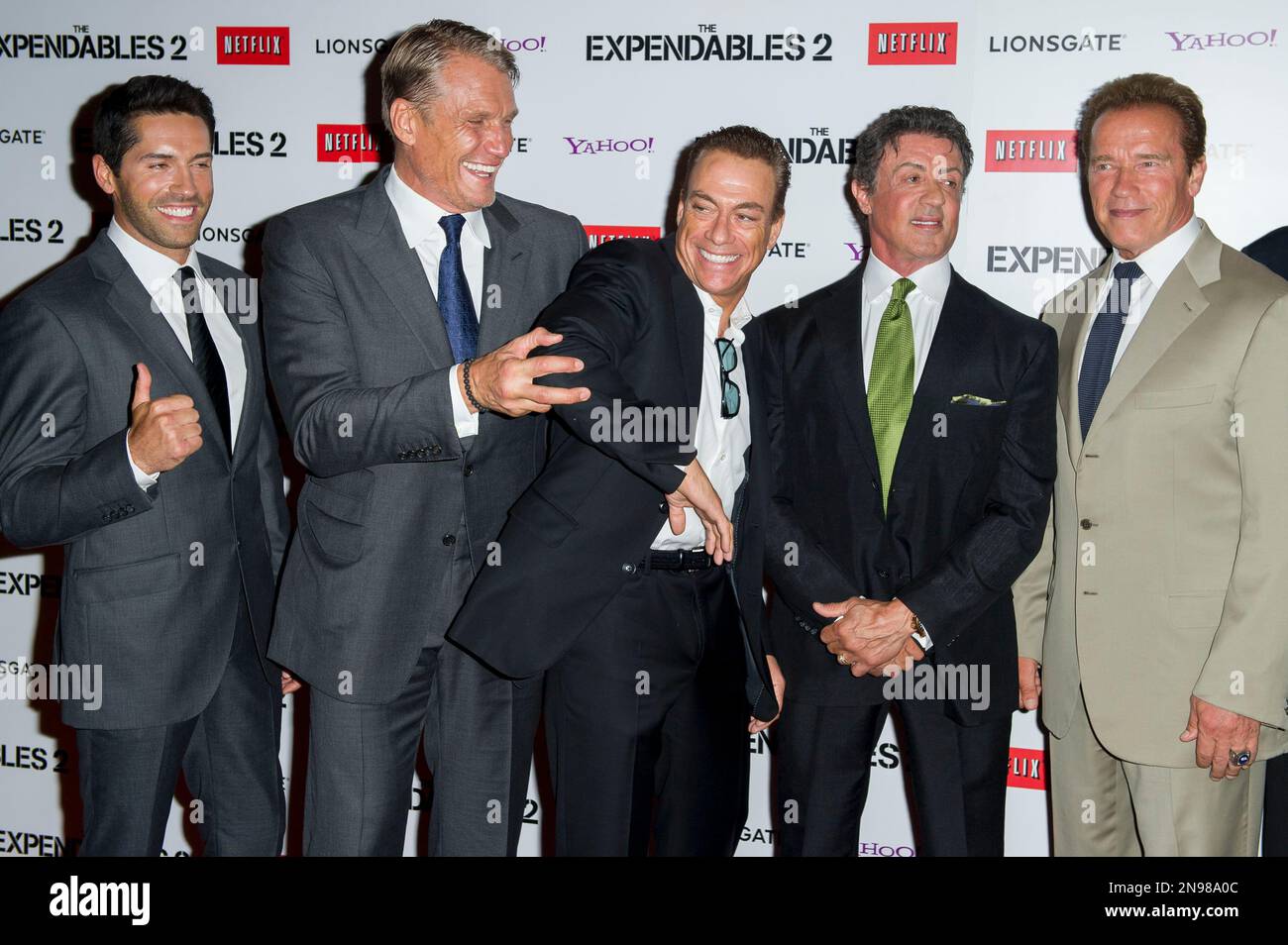 From left, British actor, Scott Adkins, Swedish actor, Dolph Lundgren ...