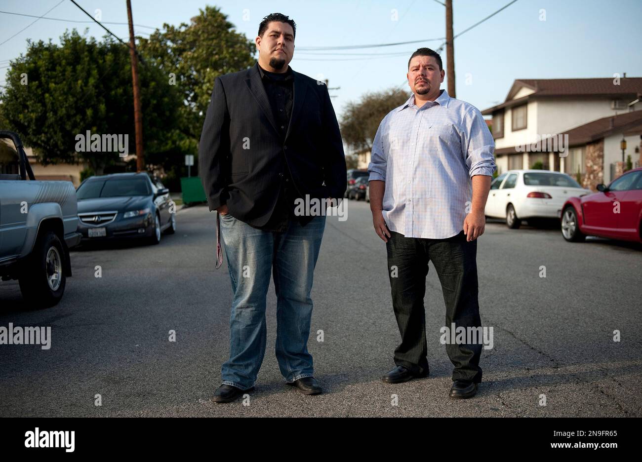 Rich Sanchez, left, whose car was hit twice by then U.S. Commerce ...