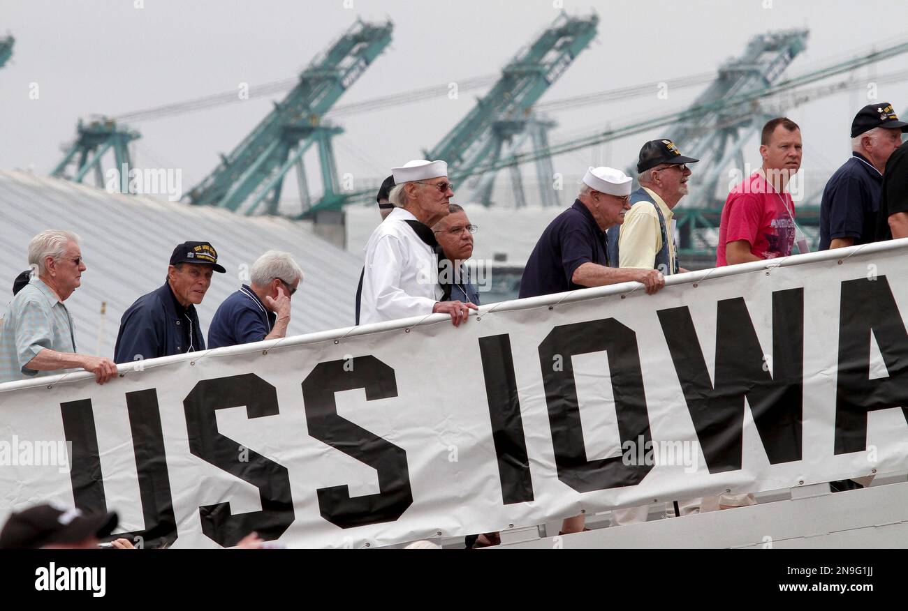 Former USS Iowa crew members board the ship during the commissioning ...