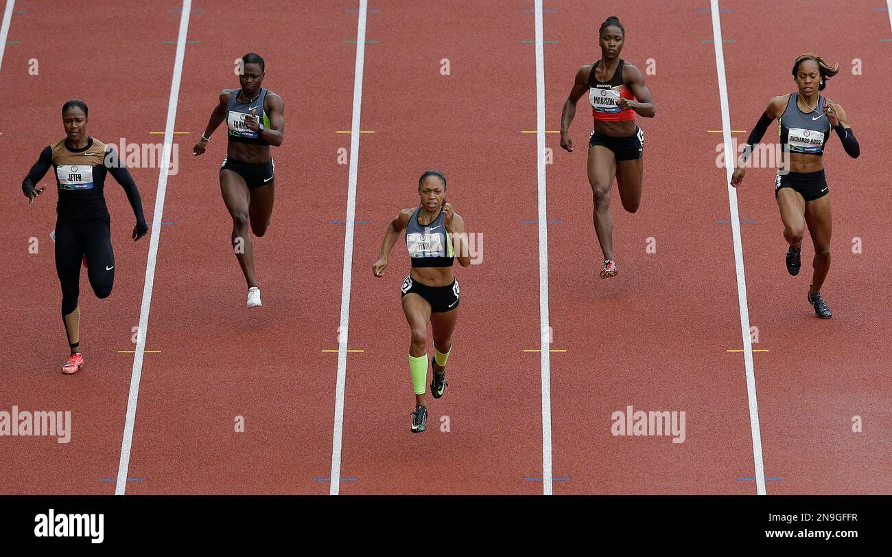 Allyson Felix, center, leads the pack in the women's 200 meter final at ...