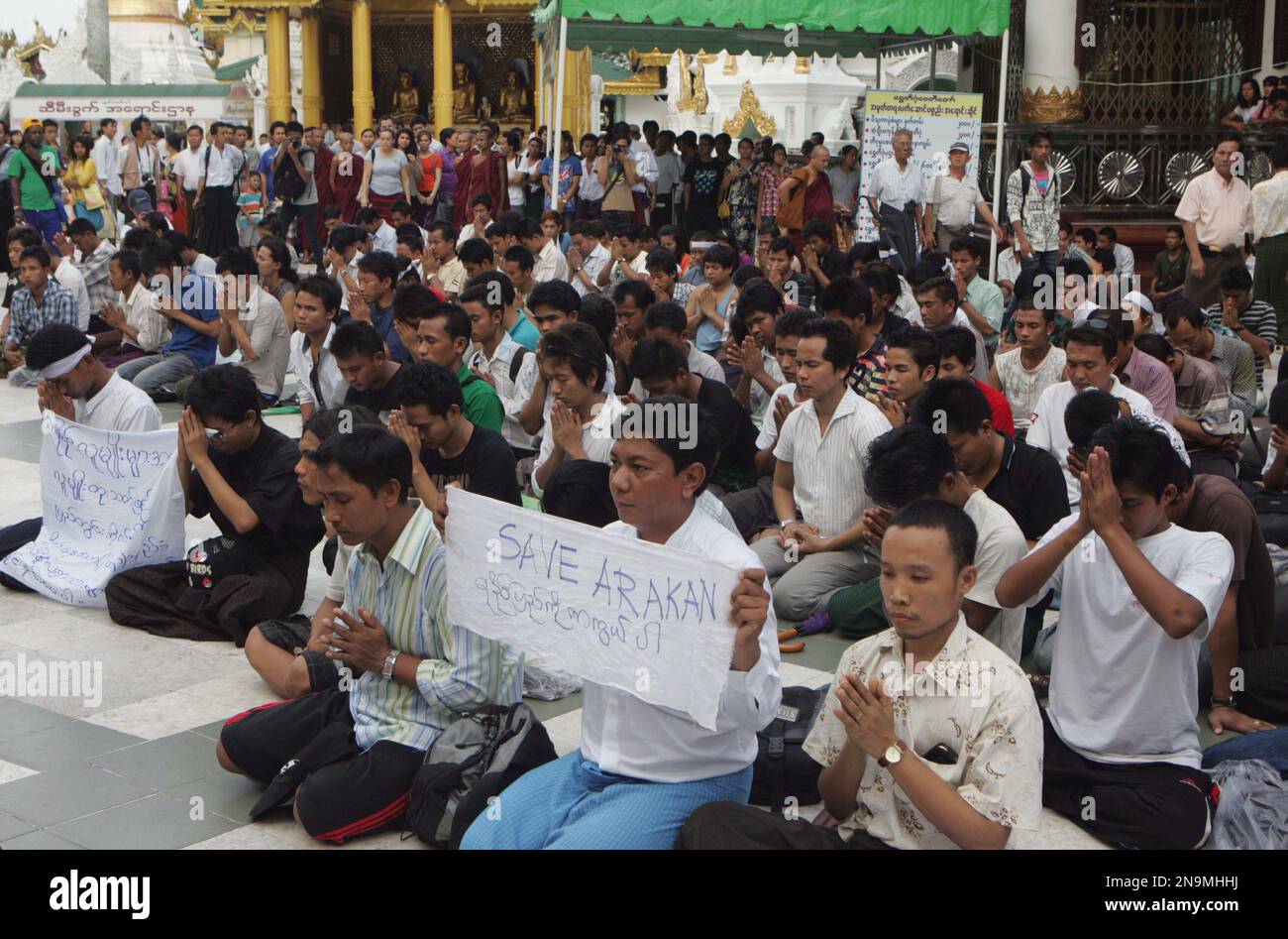 Myanmar's Rakhine ethnic people pray at Shwedagon pagoda on Saturday ...