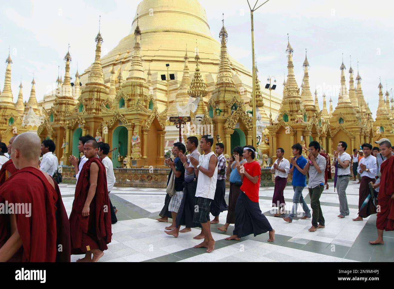 Myanmar's Rakhine ethnic people pray at Shwedagon pagoda on Saturday ...