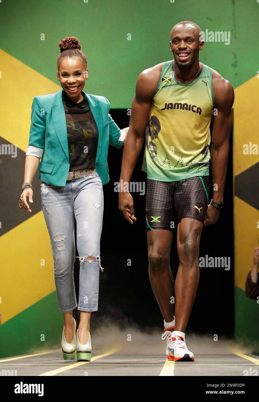 Jamaica's sprinter Usain Bolt models a Jamaica Olympic kit with ...