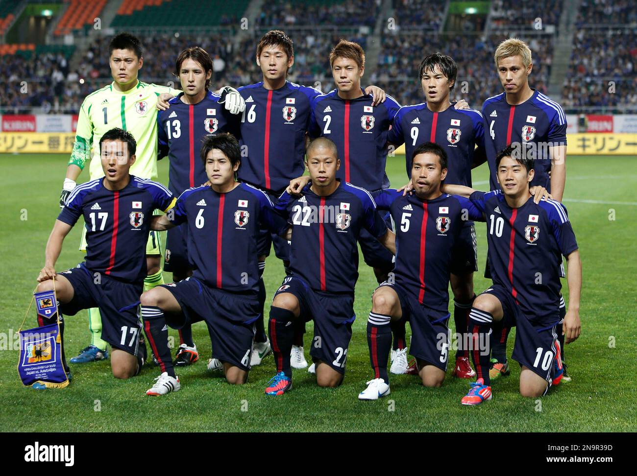 Japan's team players pose prior to their international friendly soccer ...