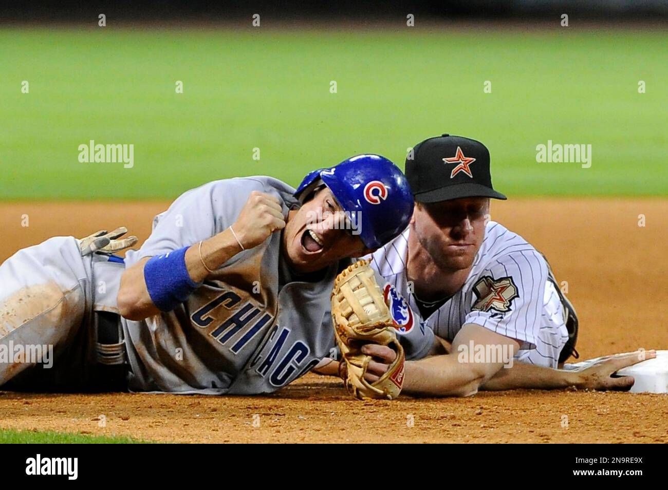 Chicago Cubs pinch runner Tony Campana, left, and Houston Astros' Matt ...