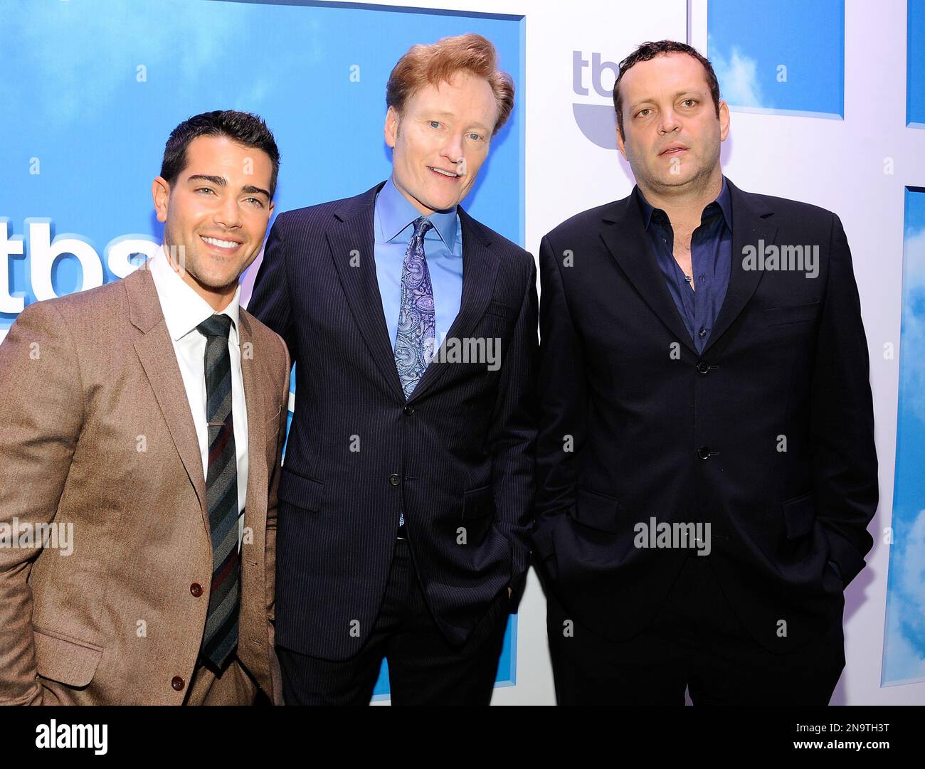 Talk show host Conan O'Brien, center, poses with actors Jesse Metcalfe ...