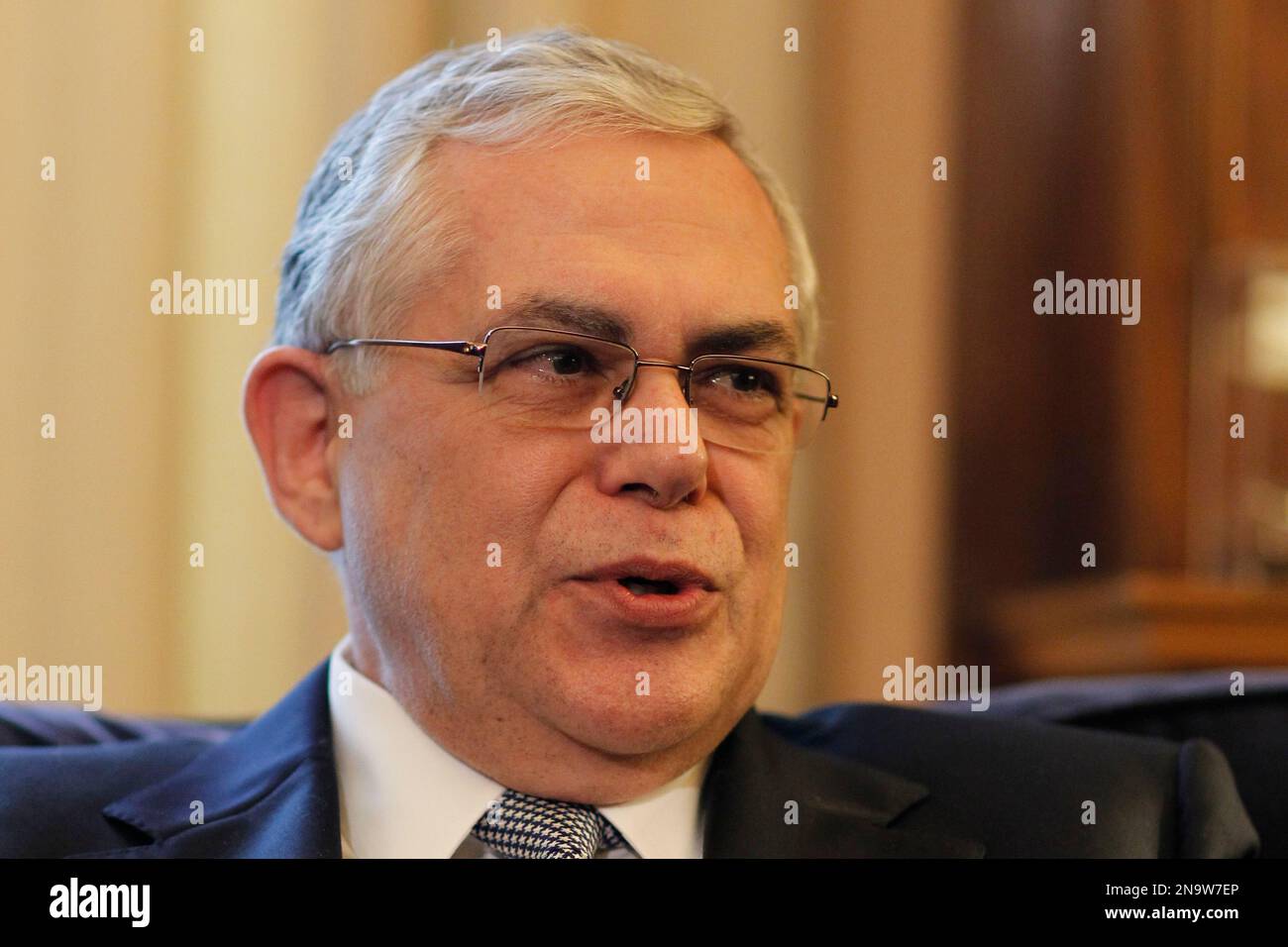 Greeces' Prime Minister Lucas Papademos speaks to Greek President ...