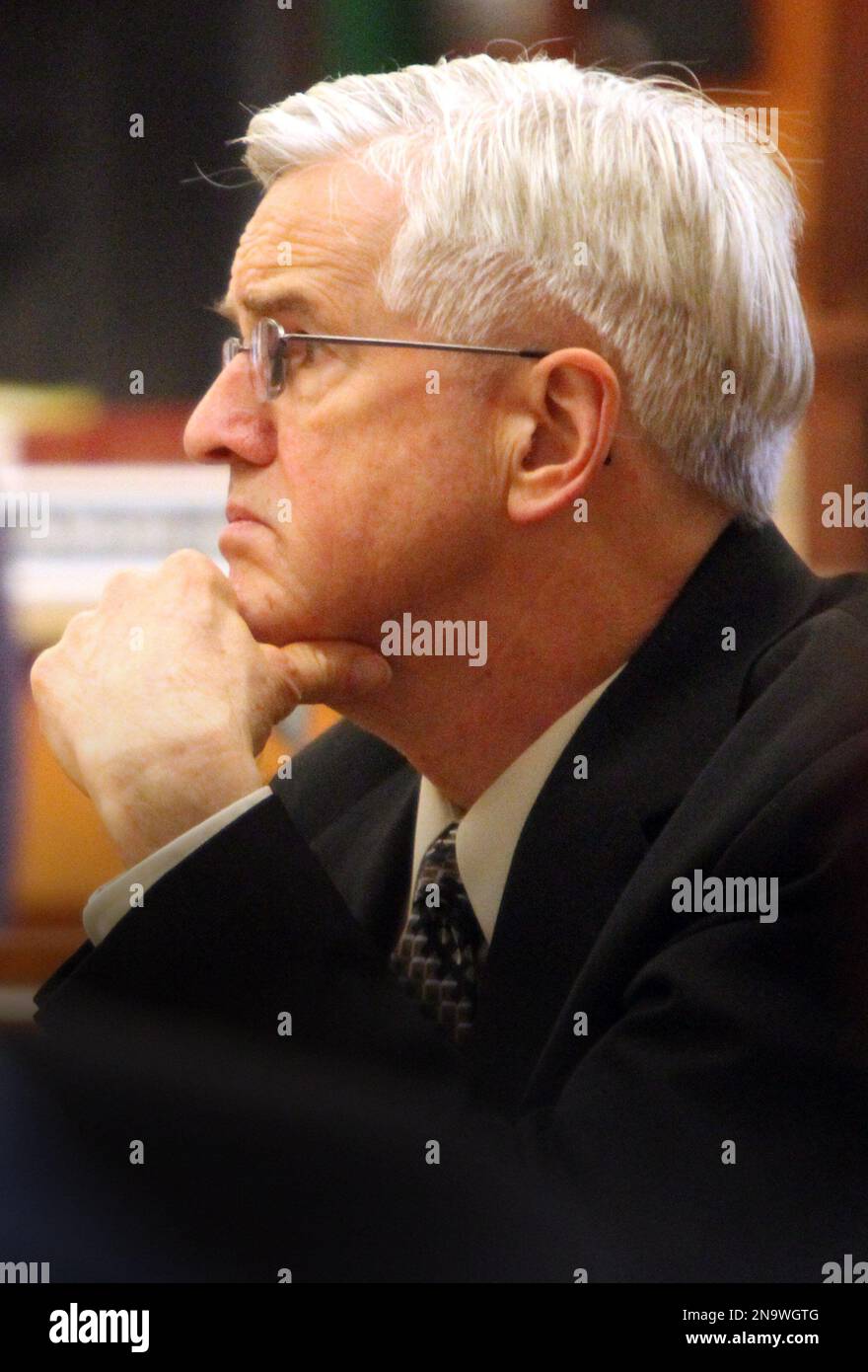 Steve Powell listen's the second day of his trial on voyeurism charges ...