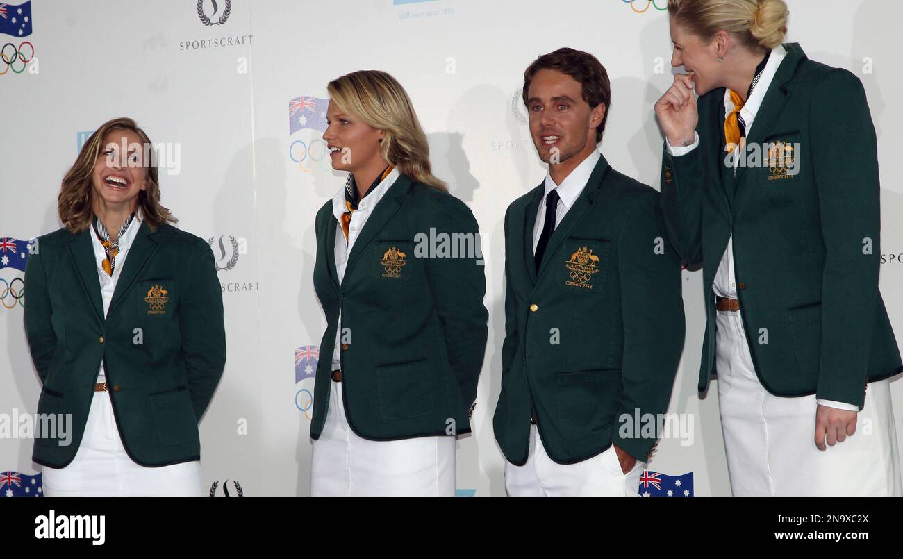 Australian Olympic team athletes in official uniform, have a light ...
