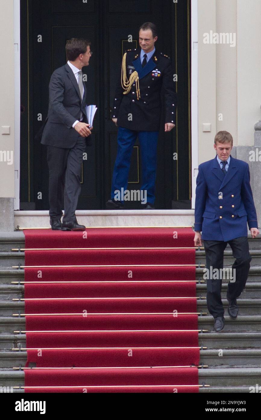 Dutch prime minister Mark Rutte, left, leaves royal palace Huis ten ...