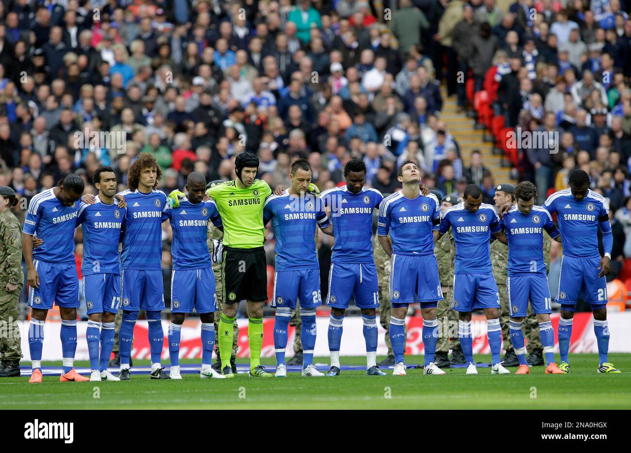 Chelsea players observe a moment of silence in memory of the ...