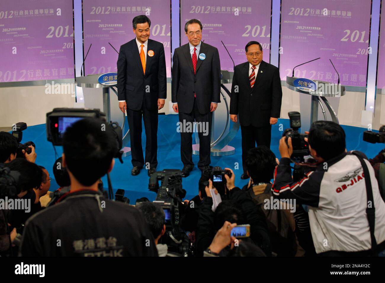 From left, former convener of Hong Kong's Executive Council, Leung Chun-ying, Former Hong Kong ...