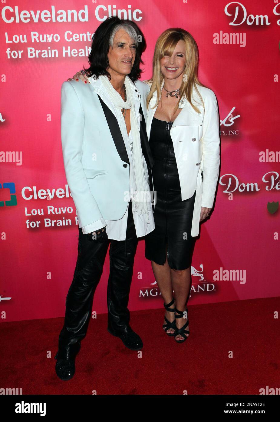 Aerosmith guitarist Joe Perry arrives with his wife Billie Perry at the ...