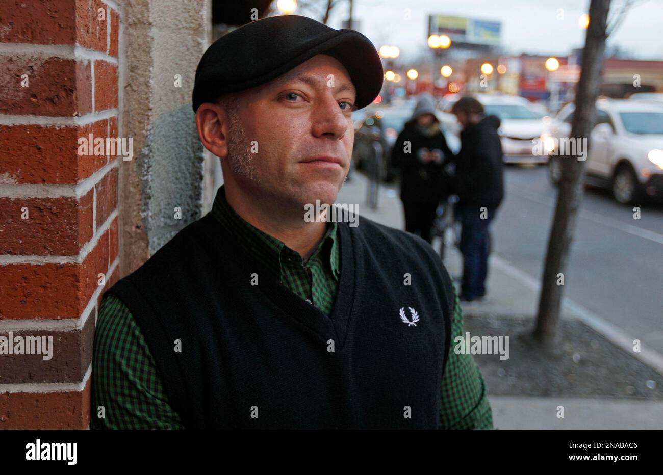 Troy Schoeller poses in the Allston neighborhood of Boston, Thursday ...