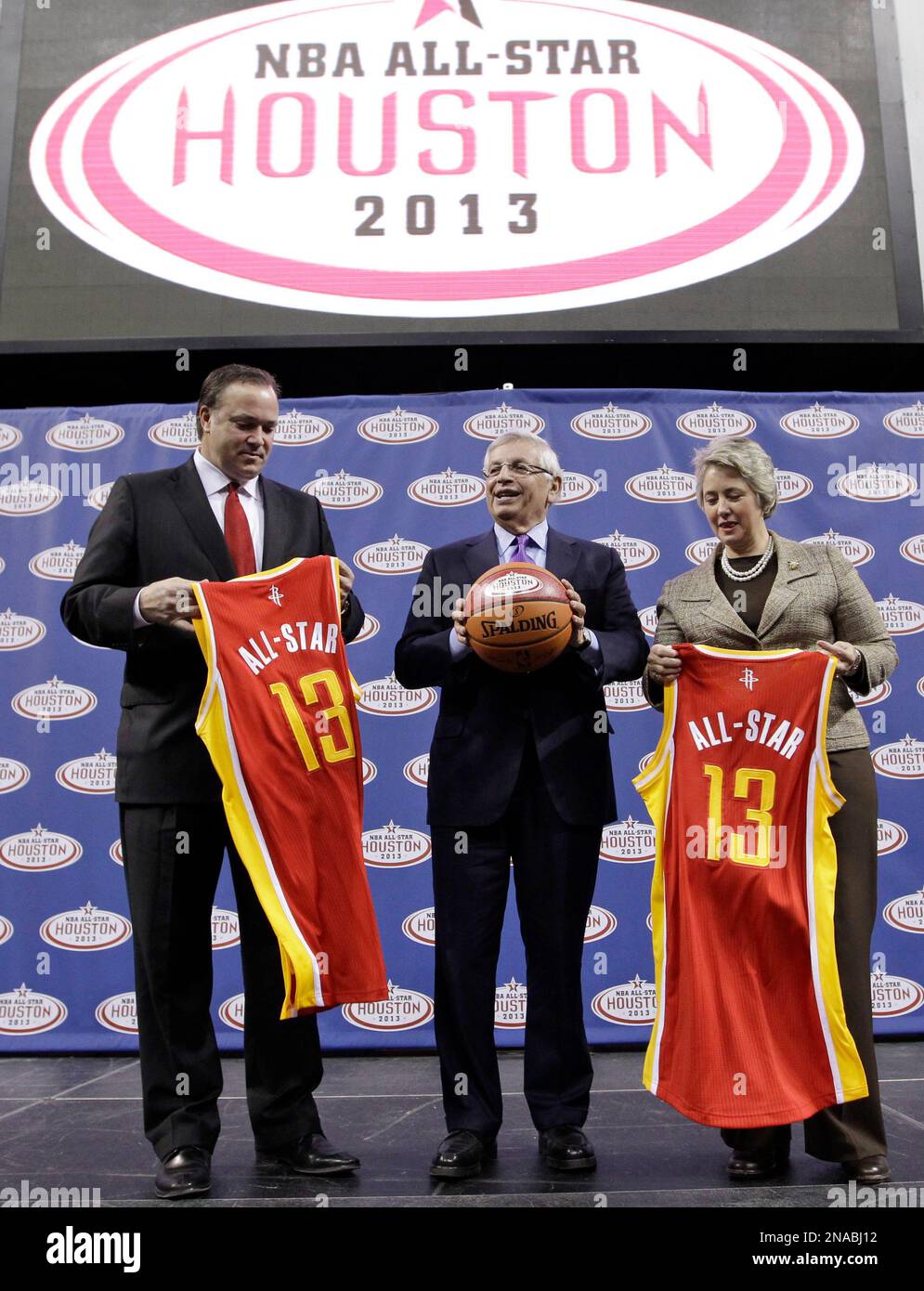 NBA Commissioner David Stern, center, talks with Houston Rockets chief ...