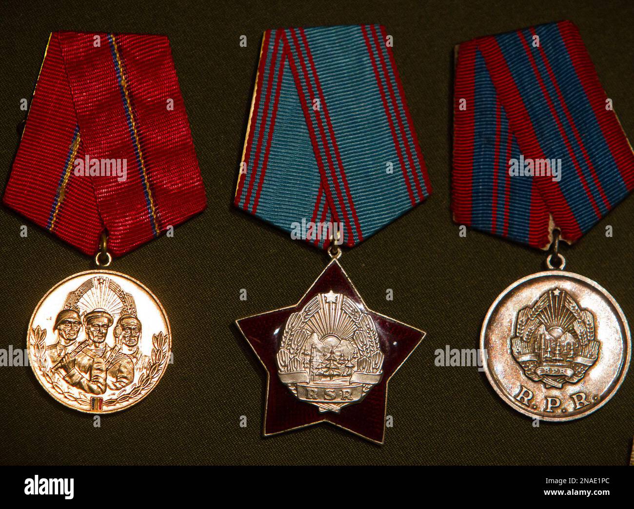 In this photo taken Wednesday, Jan. 25, 2012, Communist era medals are ...