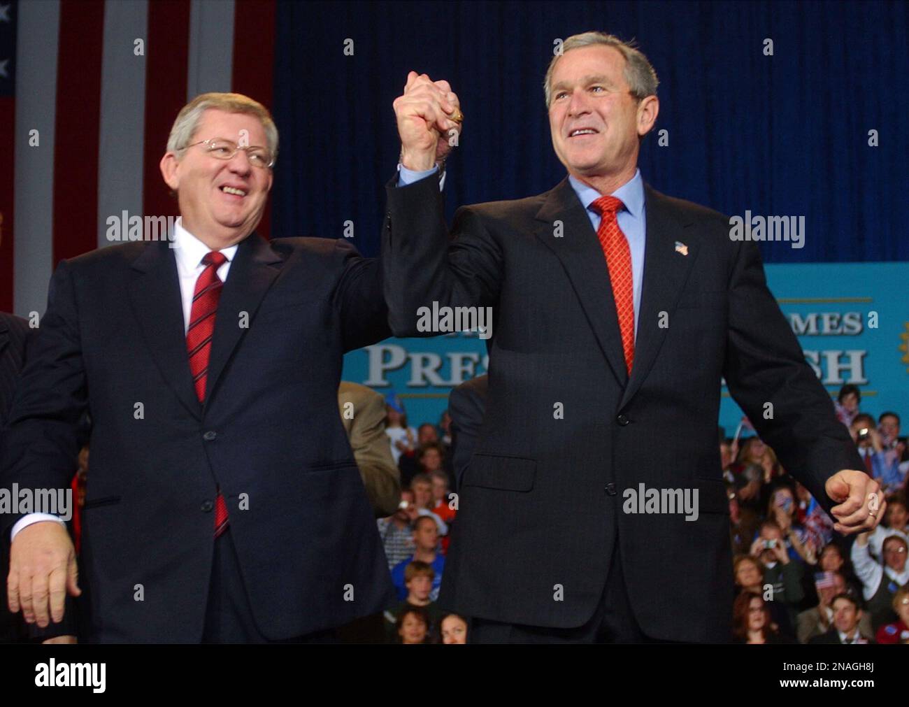 FILE - In this Oct. 31, 2002, file photo, President George W. Bush and ...