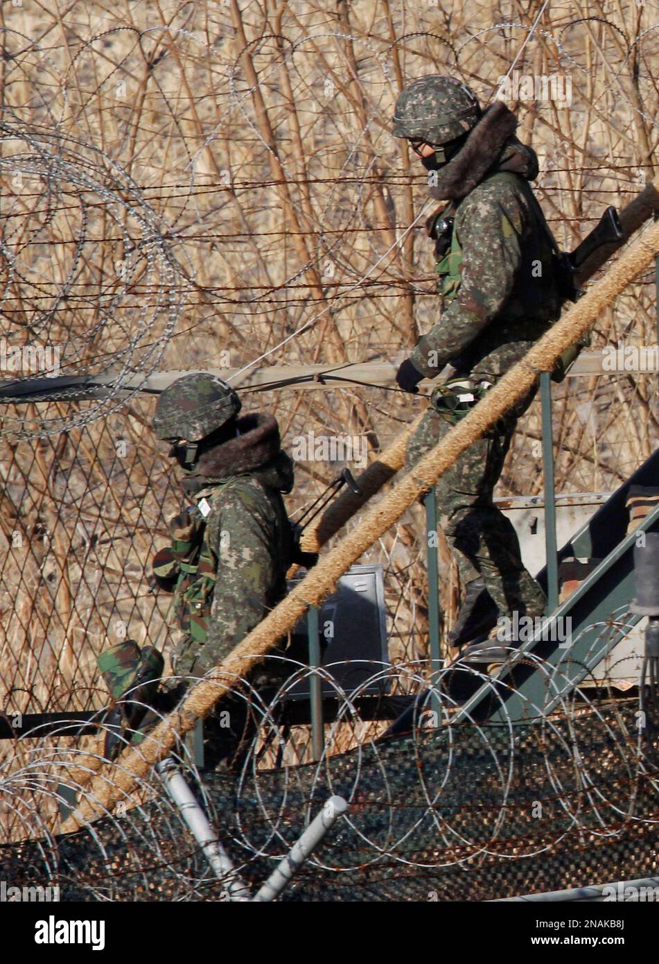 South Korean army soldiers step down from a military post guard at the ...