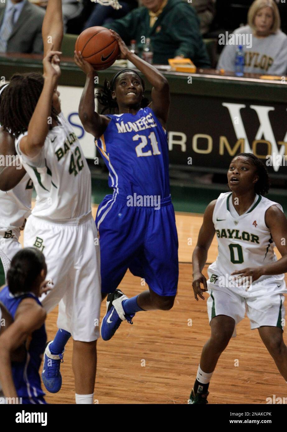 McNeese State forward Kendra Wells (21) goes up for a shot against ...